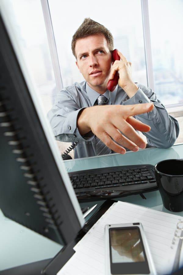 Businessman Calling and Gesturing in Office Stock Photo - Image of ...