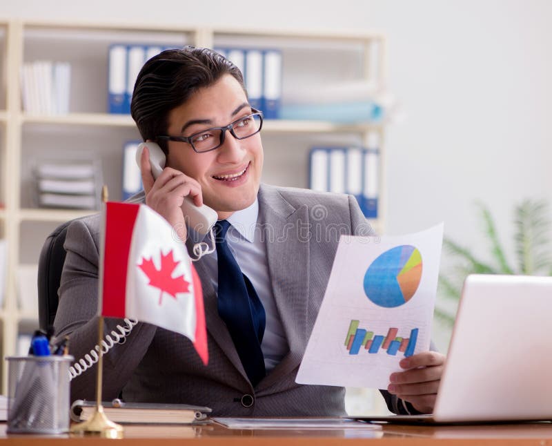 Businessman with Canadian Flag in Office Stock Photo - Image of graph ...