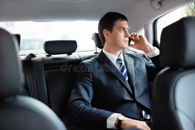 Businessman in a car stock image. Image of people, auto - 26914633