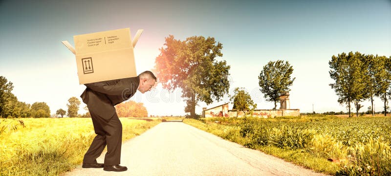 Businessman Carrying Heavy Cardboard Box on Back Stock Photo - Image of ...