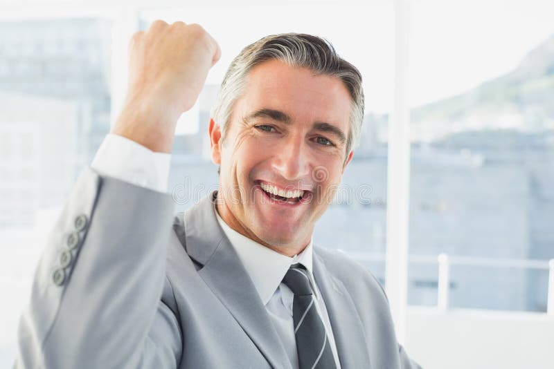 Businessman Celebrating a Good Job Stock Photo - Image of office ...