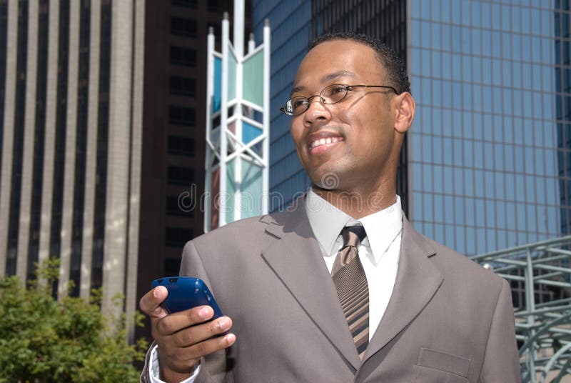 Businessman and cell phone stock image. Image of executive - 6125269