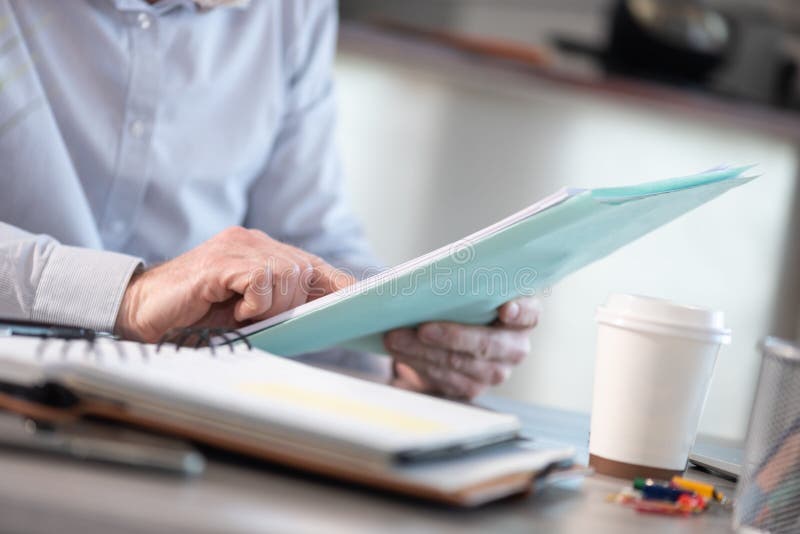 Businessman Checking a Document Stock Image - Image of data, reading ...