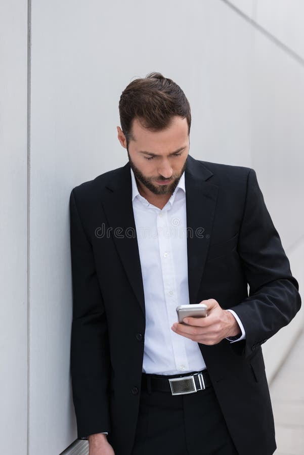 Businessman Checking His Mobile Phone Stock Photo - Image of ...