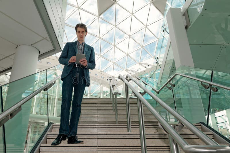 545 Businessman Checking His Tablet Stock Photos - Free & Royalty-Free ...