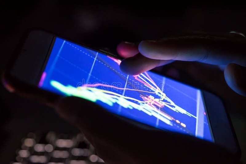 Businessman Checking Stock Charts on a Mobile Device. Stock Photo ...