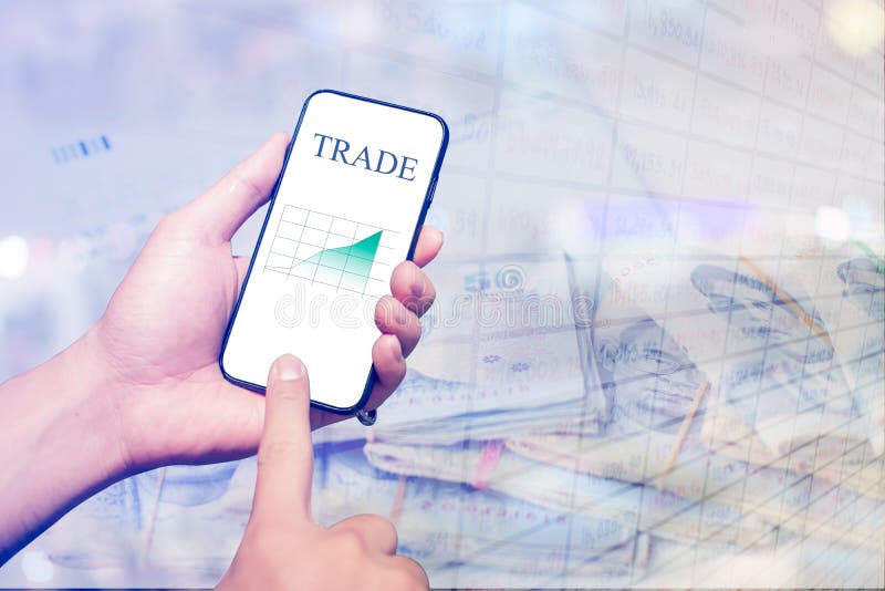 Businessman Checking Stock Market Data. he Using a Mobile Phone Stock ...