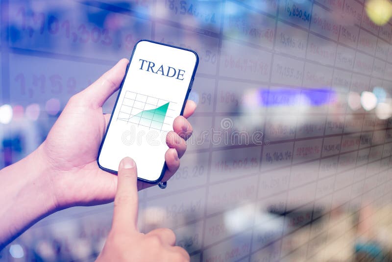 Businessman Checking Stock Market Data. he Using a Mobile Phone Stock ...