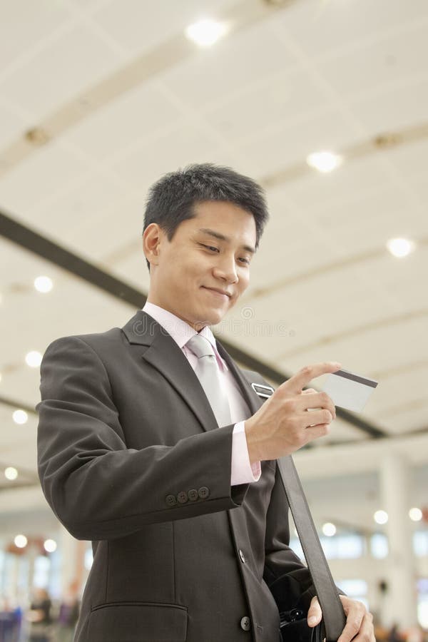 Businessman Checking the Ticket Stock Photo - Image of holding, journey ...
