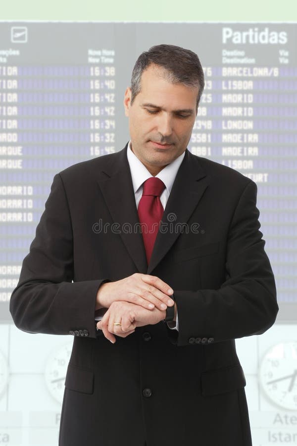Businessman Checking Time on His Watch Stock Image - Image of ...