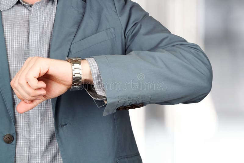 Businessman Checking Time on His Watch . Stock Photo - Image of ...