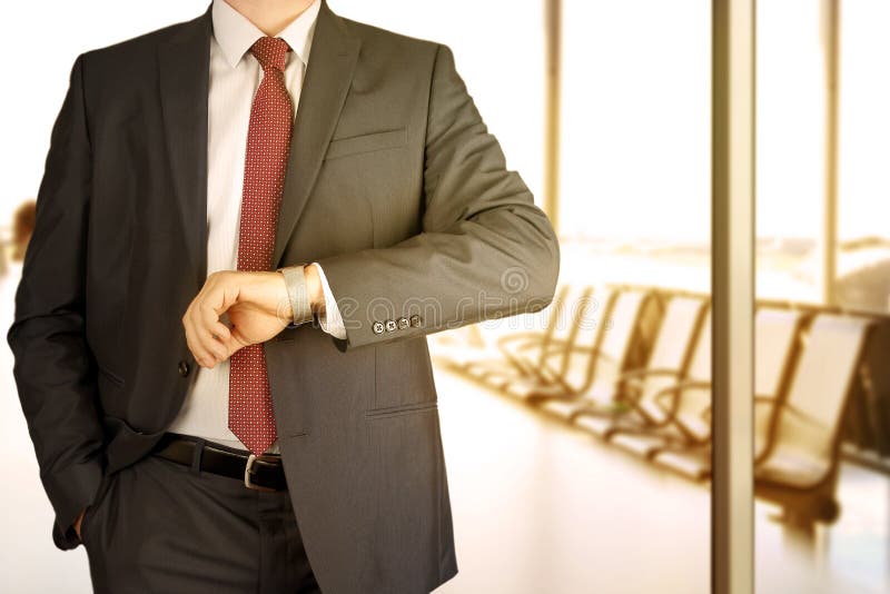 Businessman Checking Time on His Watch at Office Stock Photo - Image of ...