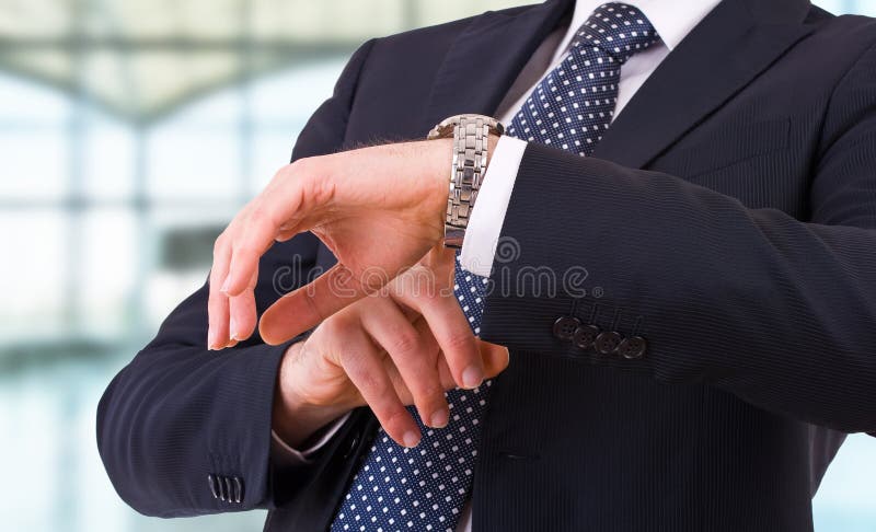 Business Man Checking Time on His Wristwatch. Stock Photo - Image of ...