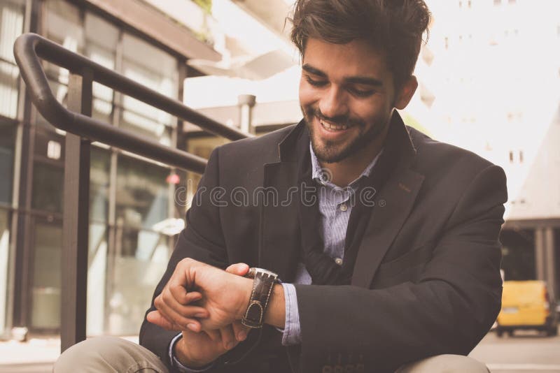 Businessman Checking Time on Watch. Stock Image - Image of business ...