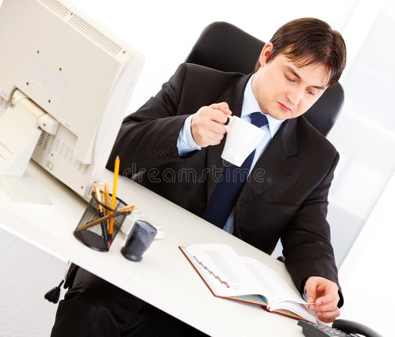 Businessman Checking Timetable in Diary Stock Photo - Image of computer ...