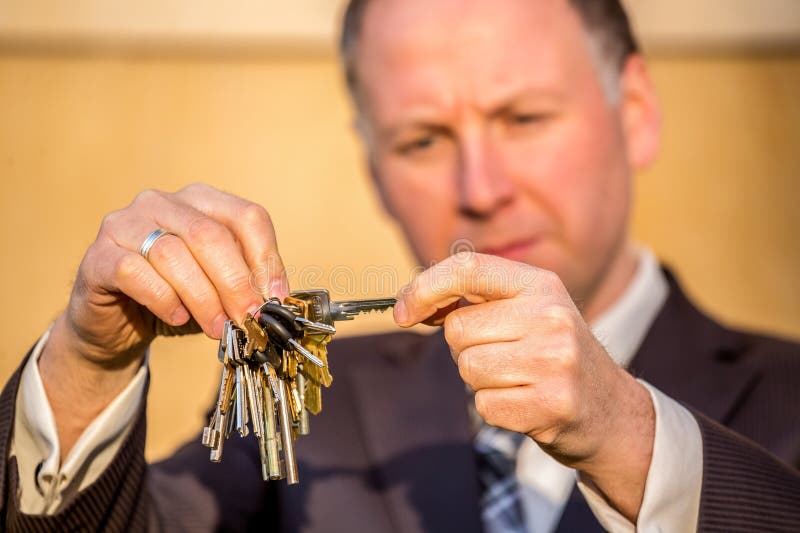 Businessman Choosing the Right Key Stock Photo - Image of lock, search ...