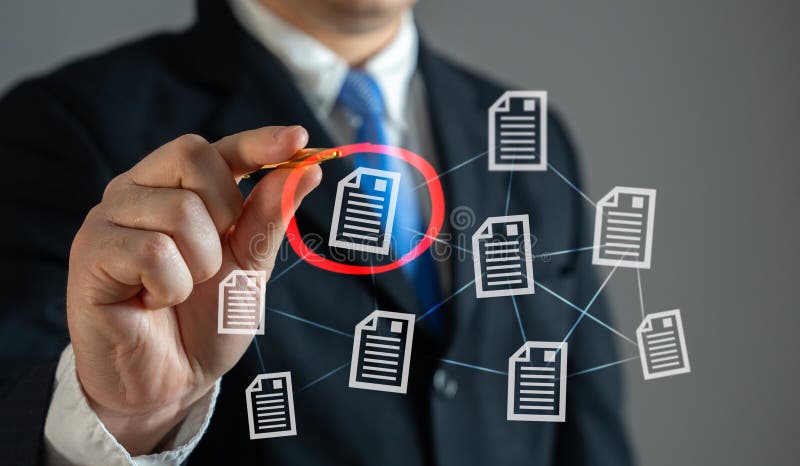 The Businessman Circles the Required Document in Red. Stock Photo ...