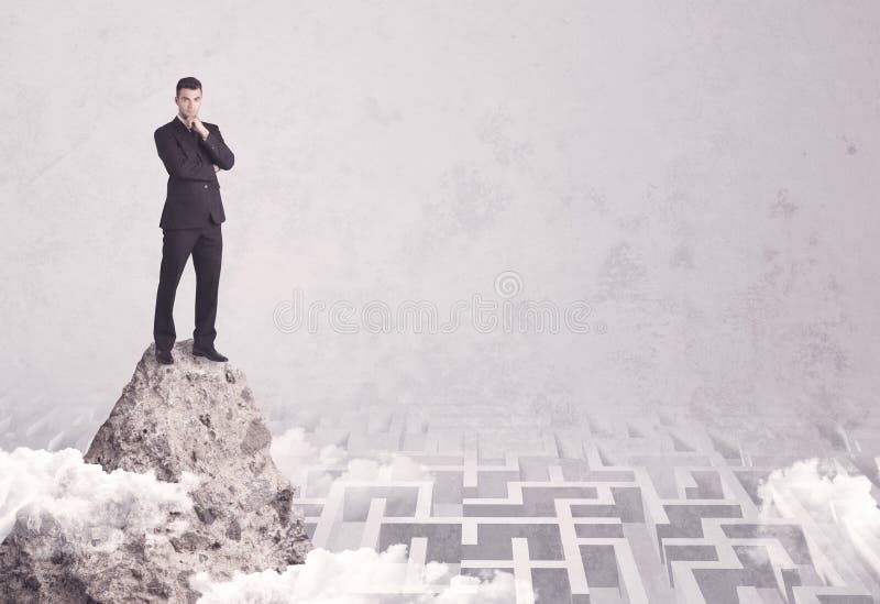 Businessman on Cliff Above Labyrinth Stock Photo - Image of look ...