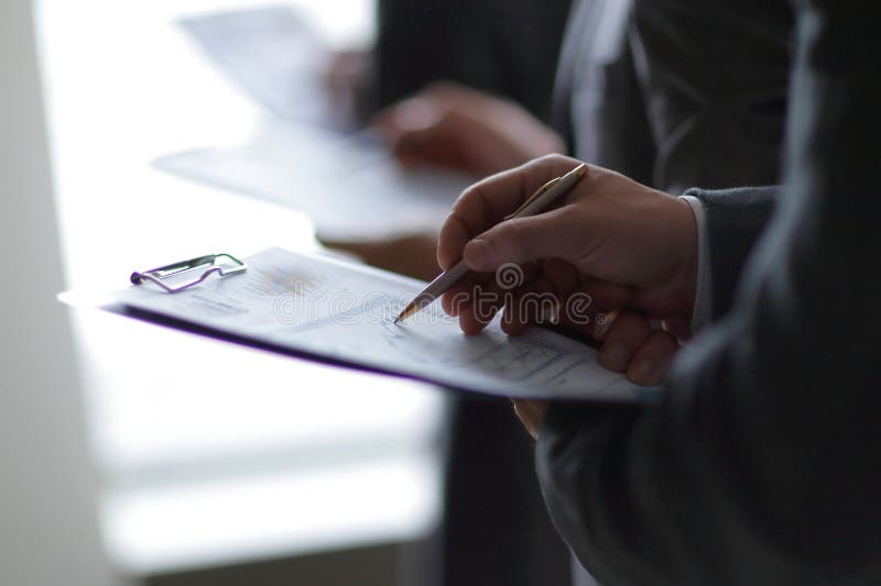 Close Up. Businessman with Clipboard Checking Statistics Stock Image ...