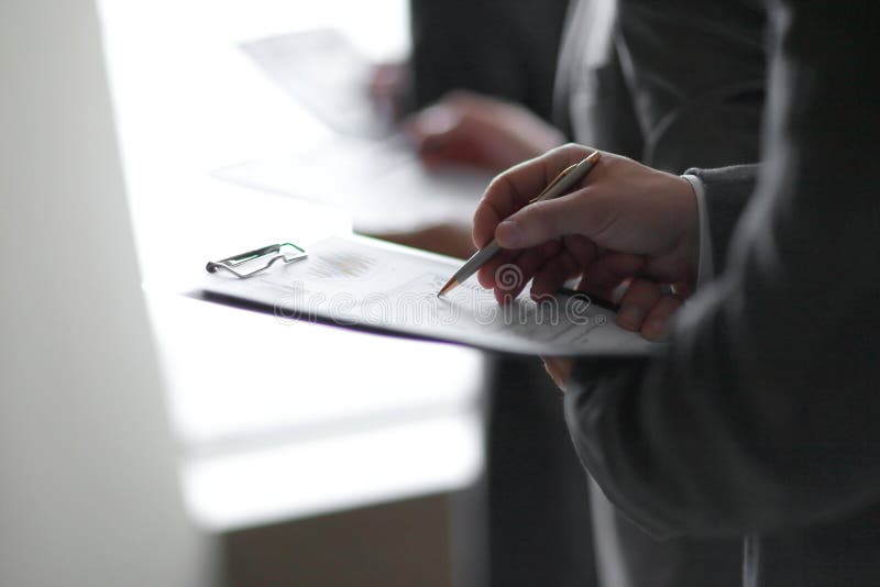 Close Up. Businessman with Clipboard Checking Statistics Stock Image ...