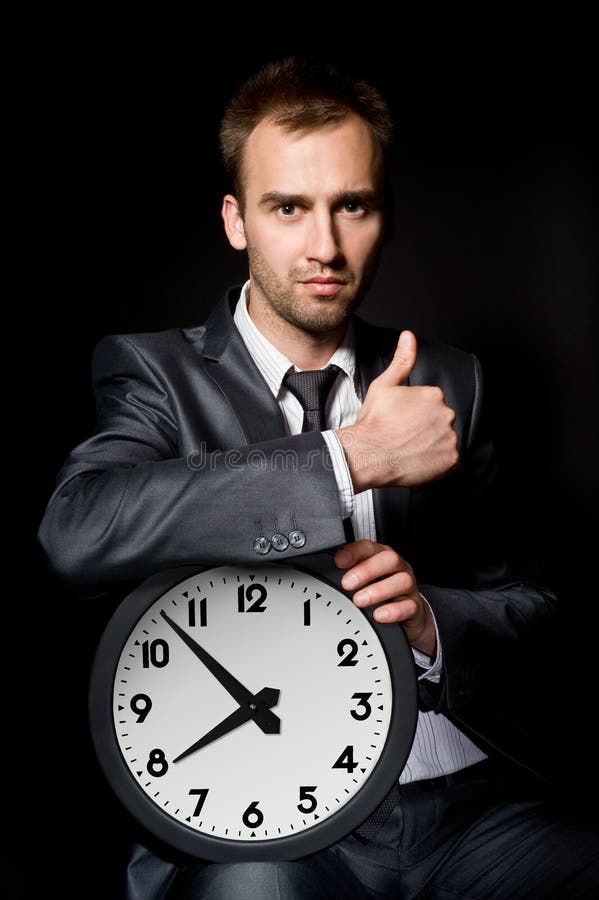 Businessman with clock stock photo. Image of corporte - 14520998