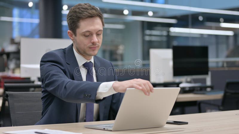 Businessman Closing Laptop Standing Up, Going Away Stock Image - Image ...