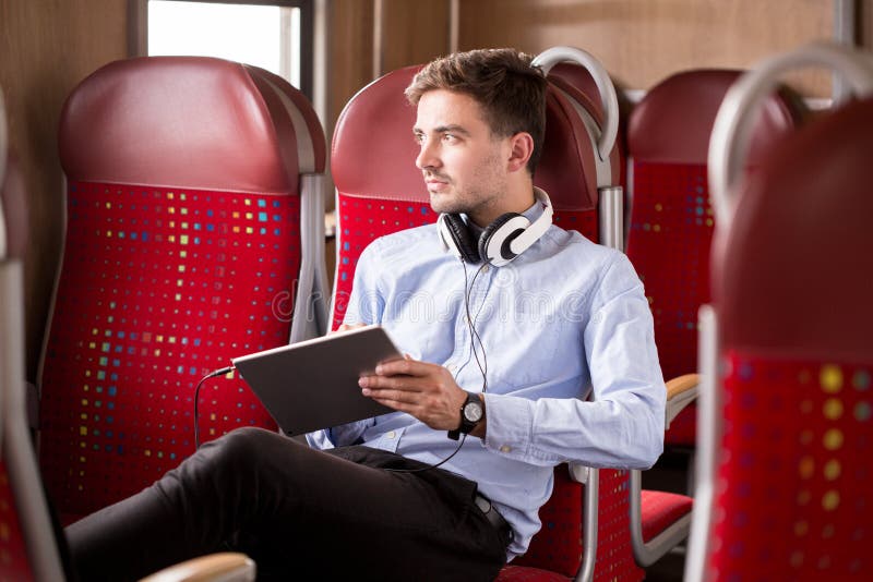 Businessman Commuting To Work Stock Image - Image of passenger, sitting ...