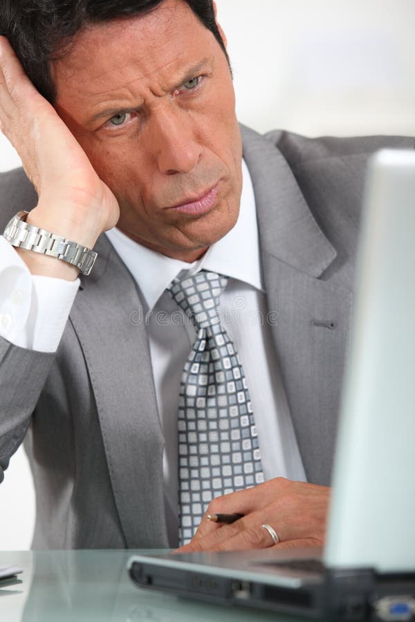 Confused Office Worker Staring at Folder Stock Photo - Image of despair ...
