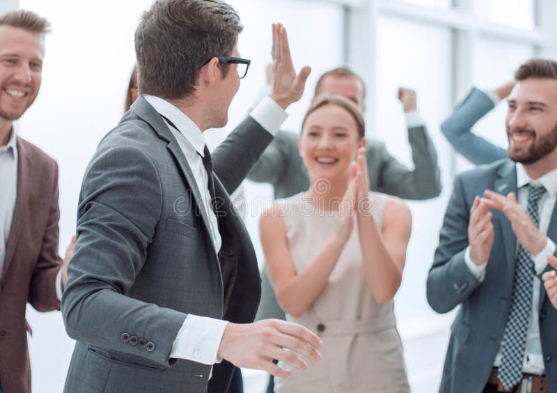 Businessman Congratulating His Team on the Victory. Stock Image - Image ...