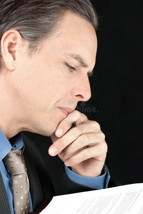 Businessman Considers Document Stock Image - Image of reading, person ...