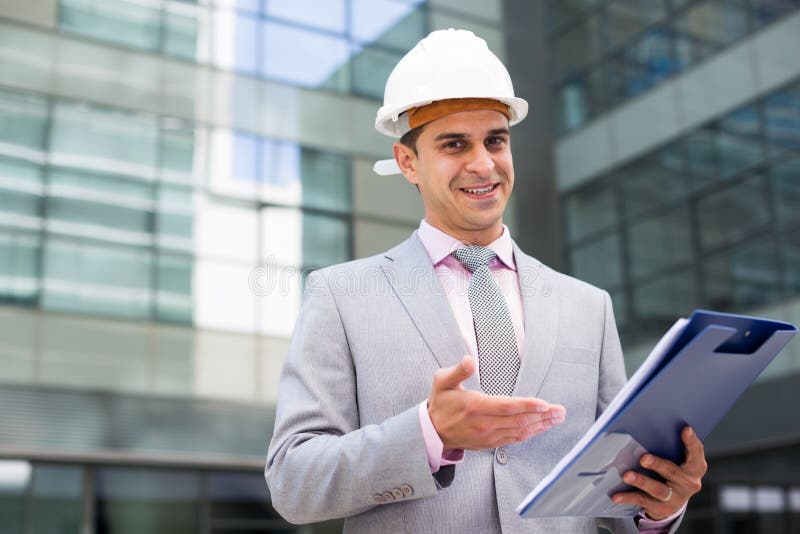Businessman Contentedly Reading Documents Stock Photo - Image of ...
