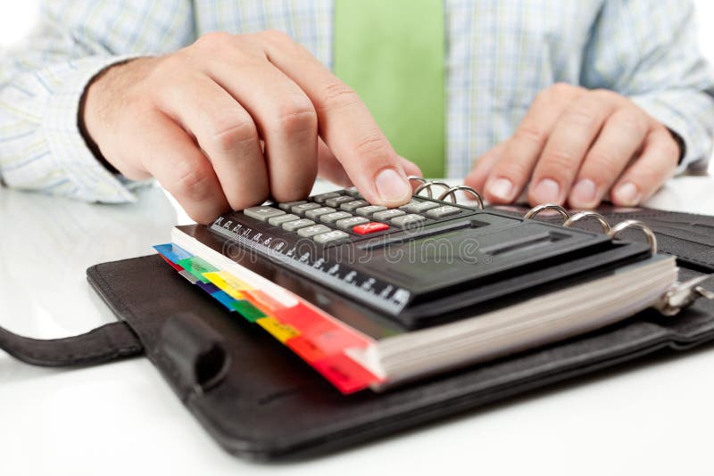 Businessman Counting on Calculator. Stock Image - Image of account ...