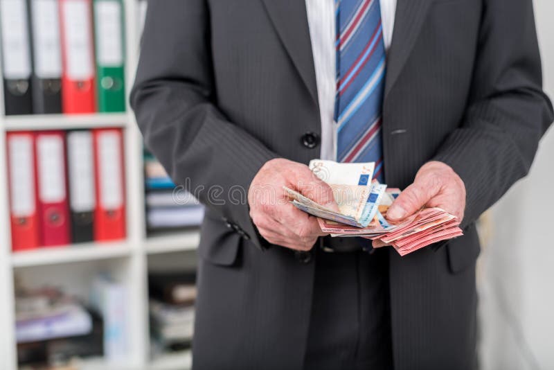 Businessman Counting His Money Stock Image - Image of expenditure ...