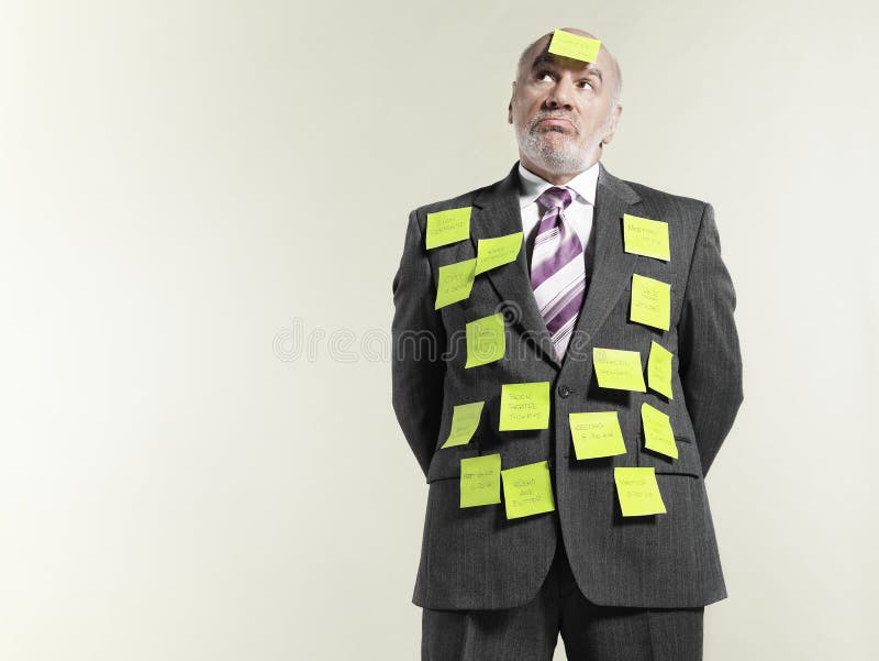 Young Man with a Sticky Note on His Face, Covered with Yellow Stickers ...