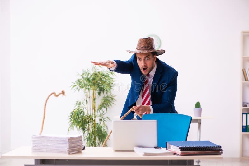 Young Businessman Cowboy Working in the Office Stock Photo - Image of ...