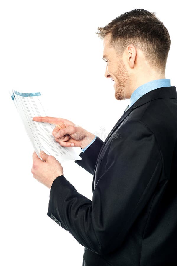 Businessman Cross-checking Annual Reports Stock Image - Image of ...