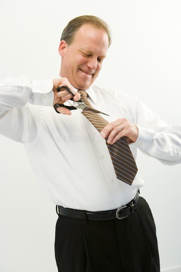 Businessman cutting tie stock photo. Image of weird, caucasian - 5645812