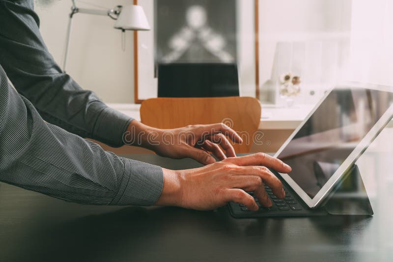 Businessman or Designer Using Digital Tablet Computer on Black D Stock ...