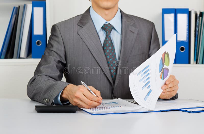 Businessman at the Desk at Office Stock Photo - Image of laptop ...