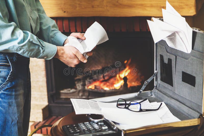 Businessman Destroying Important Documents from Case in Firepla Stock ...