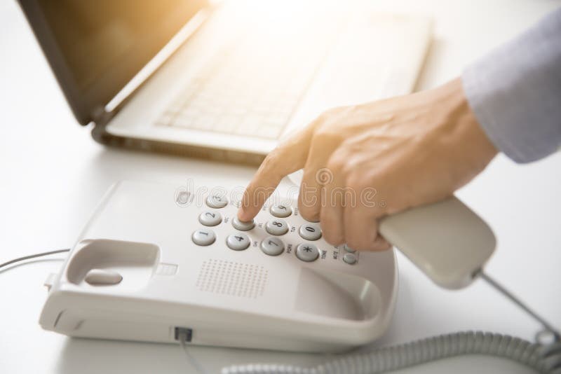 Businessman Dial Digital Telephone with Office Background Stock Image ...