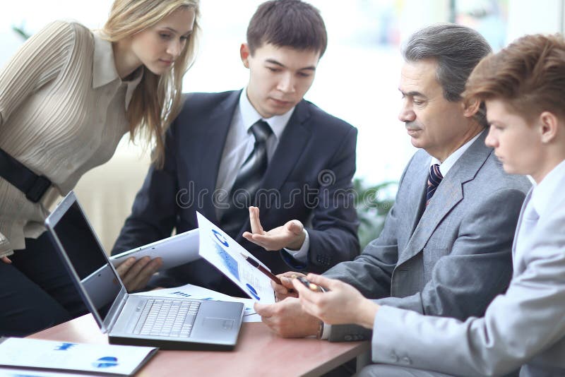 Businessman Discussing with the Business Team Working Documents Stock ...