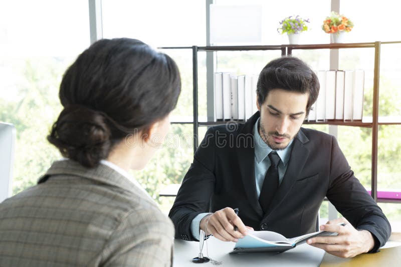 Businessman Discussing Working Problems or Business Plan with His ...