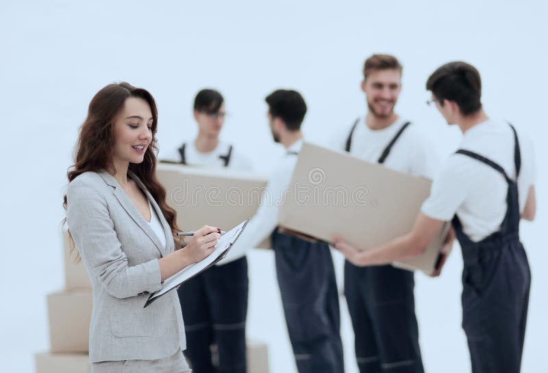 Businessman with Documents, Creating a Stack of Cardboard Boxes. Stock ...
