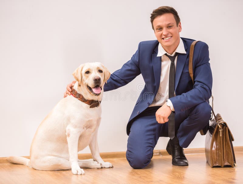 Businessman with dog stock image. Image of person, cute - 58312143