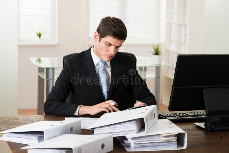 Businessman Doing Accounting Stock Photo - Image of office, desk: 57713462