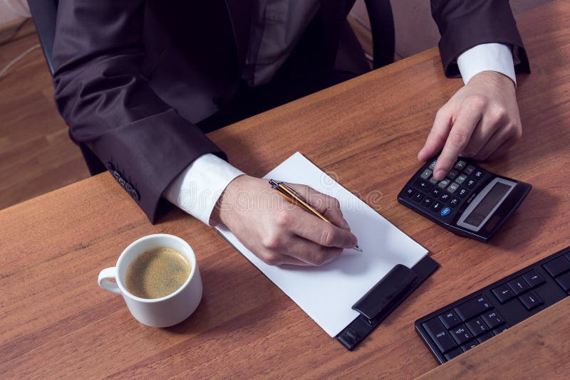 Businessman Doing Calculations Stock Image - Image of office, idea ...