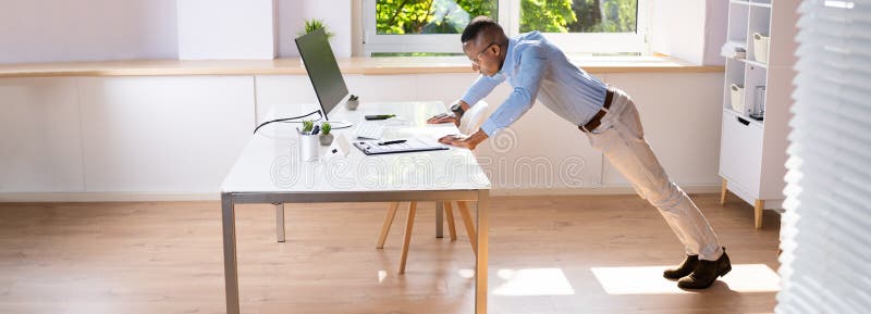 Businessman Doing Push Up on Office Desk Stock Image - Image of indoors ...