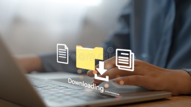 Businessman Downloads Computer Files or Installs Software on a Laptop ...
