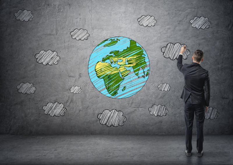 Businessman Drawing the Earth and Clouds in Colour on the Concrete Wall ...